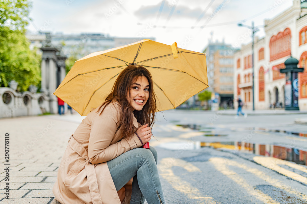 Happy Girl With Umbrella In Rain