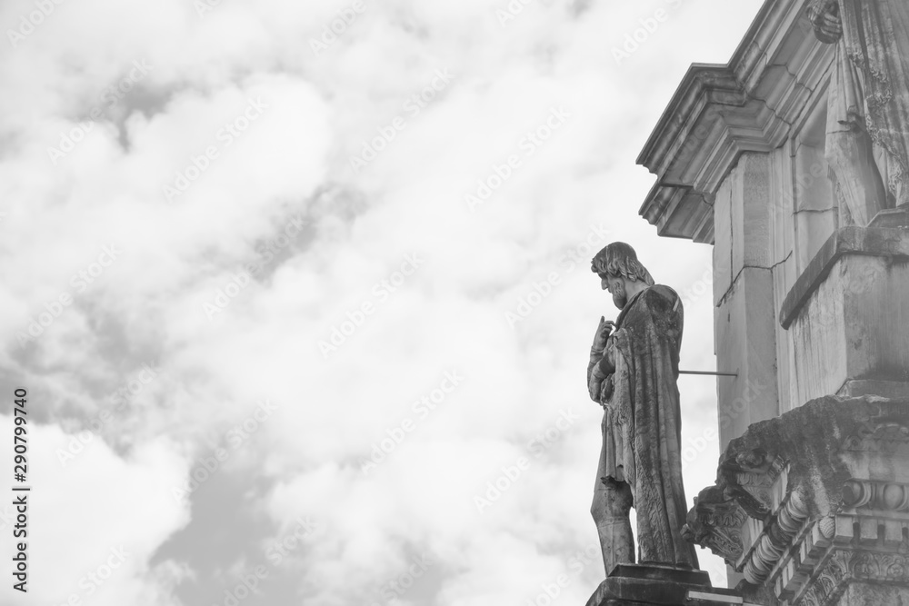Arch of Constantine statue in Rome closeup on clouds and sky background ...