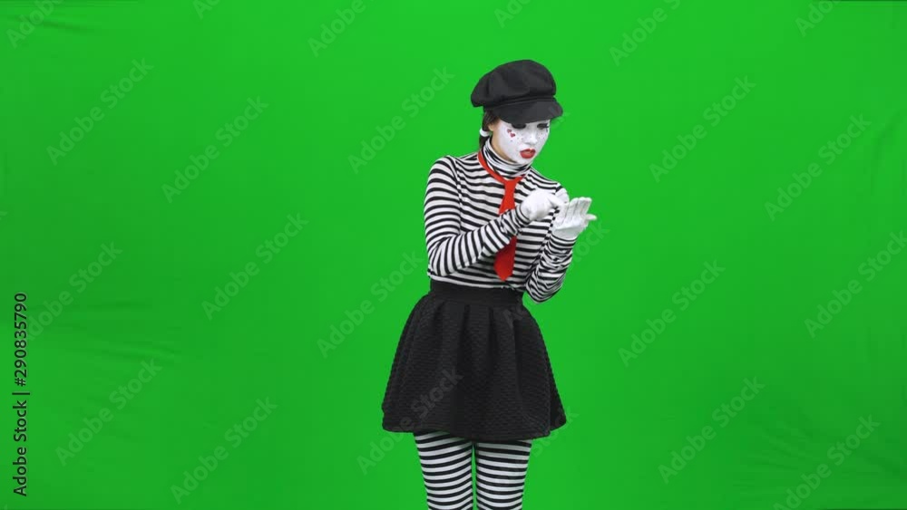 Mime woman is having call, talking. Green screen, Chroma key. Stock ...