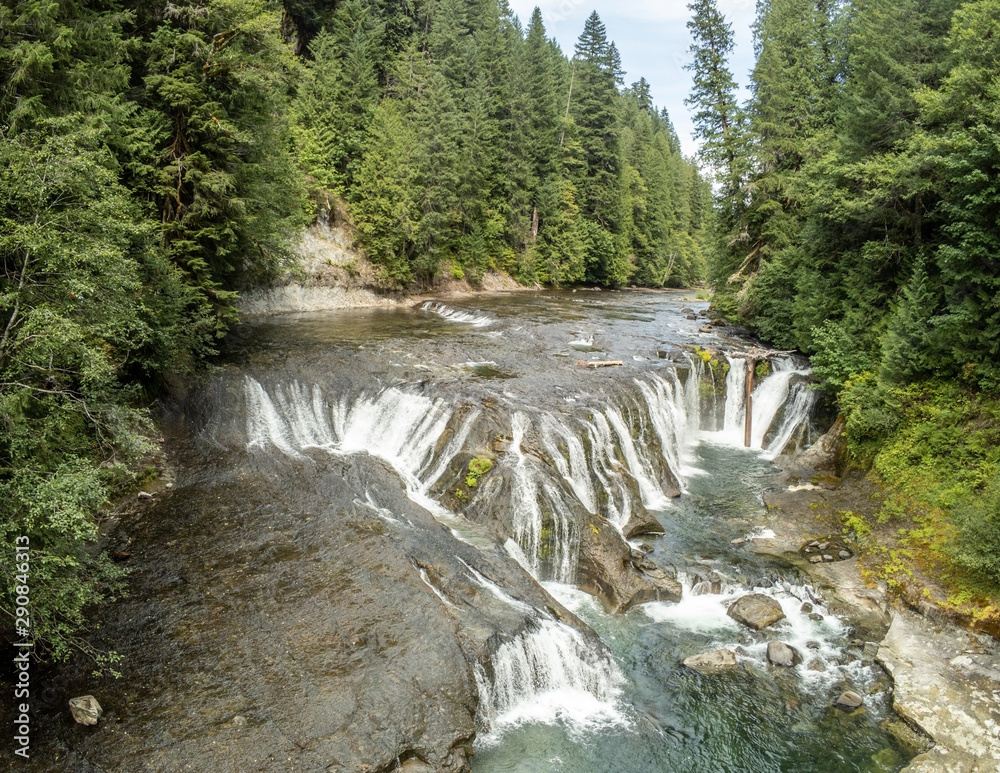 Wonderful aerial pictures of Middle Lewis River Falls on the rugged ...