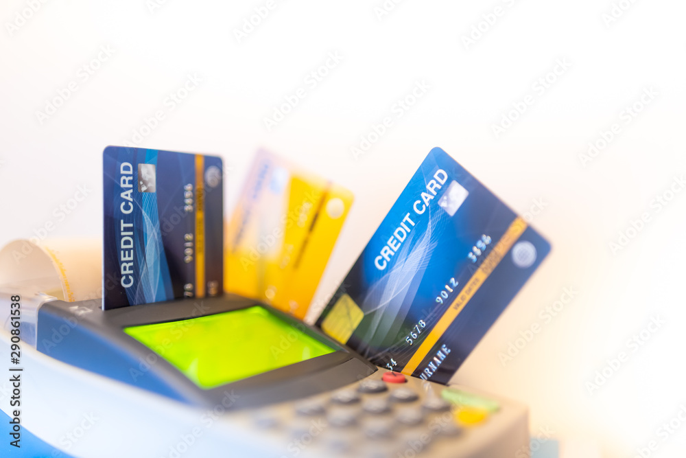 Many credit cards are used in the shop. Shopping and retail concepts ...