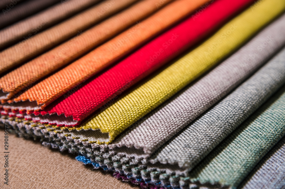 Colorful and bright fabric samples of furniture and clothing upholstery ...