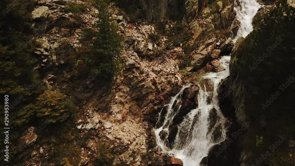 Tilt shot of wild water stream running over rocks in France Stock Video ...