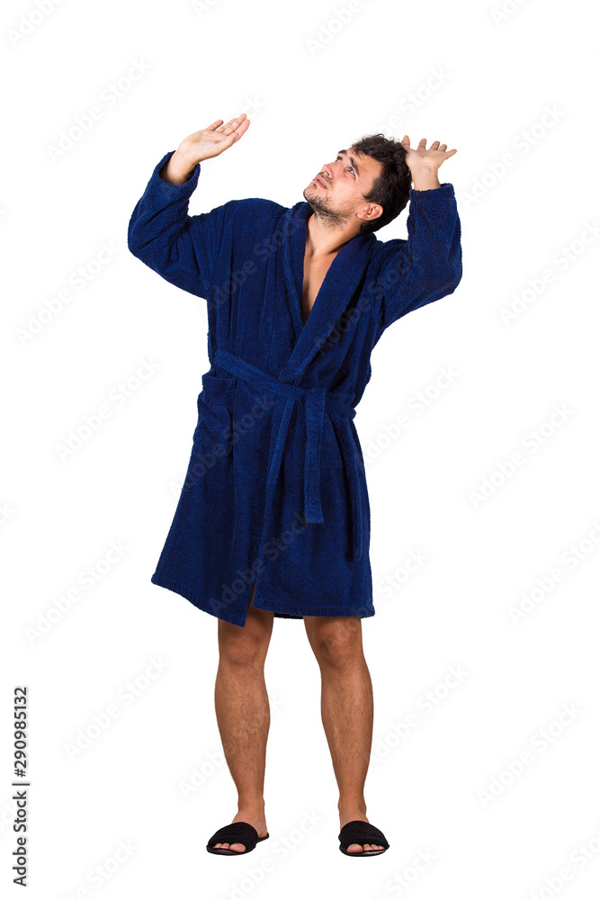 Full length portrait of scared young man messy hair, wears blue ...