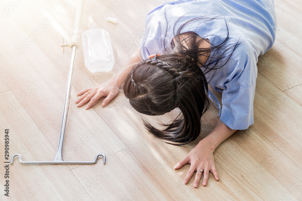 Asian female patient falling down, patient accident emergency injury ...
