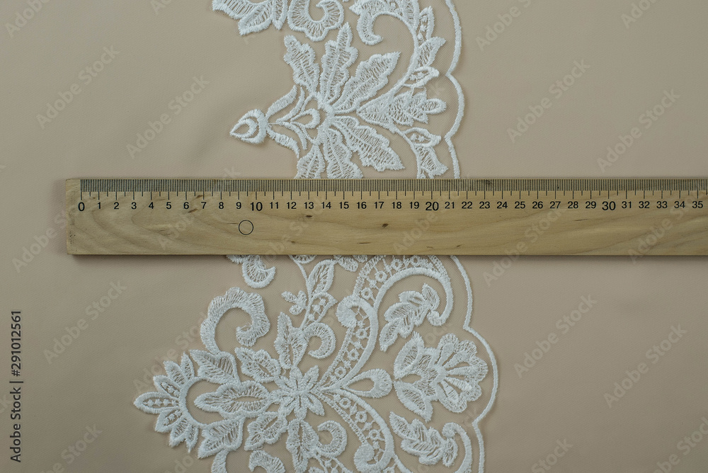 Texture lace fabric. lace on white background studio. thin fabric made ...