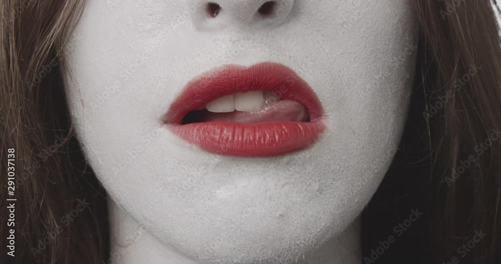 Appetite - close-up of a teenage girl, made-up for Halloween or a ...