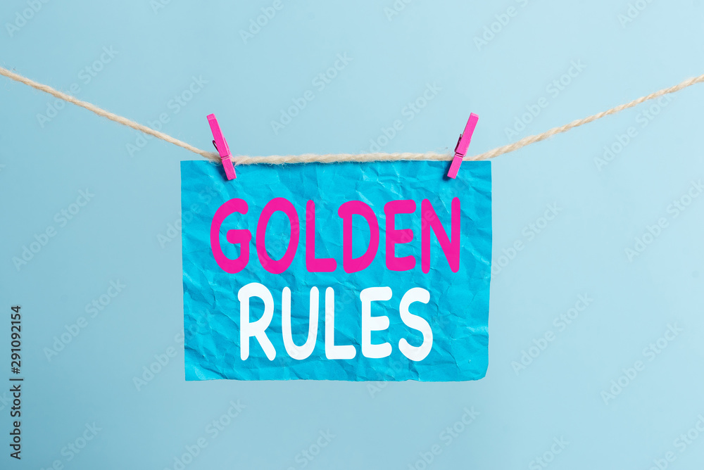 Writing note showing Golden Rules. Business concept for Basic principle ...