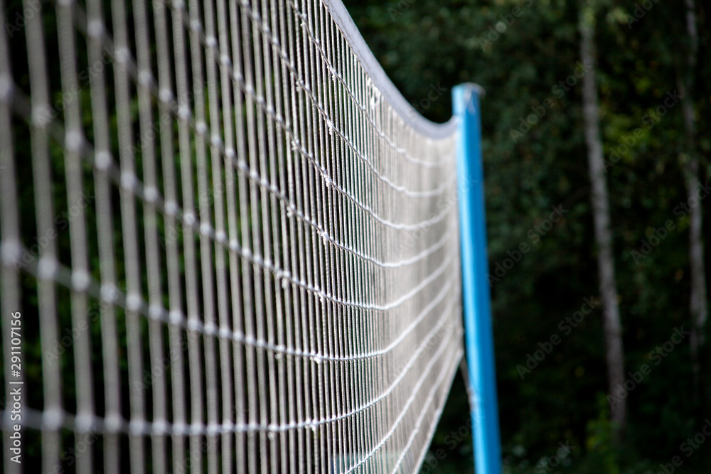 Volley ball net closeup, seen from the side up close, shallow depth of ...