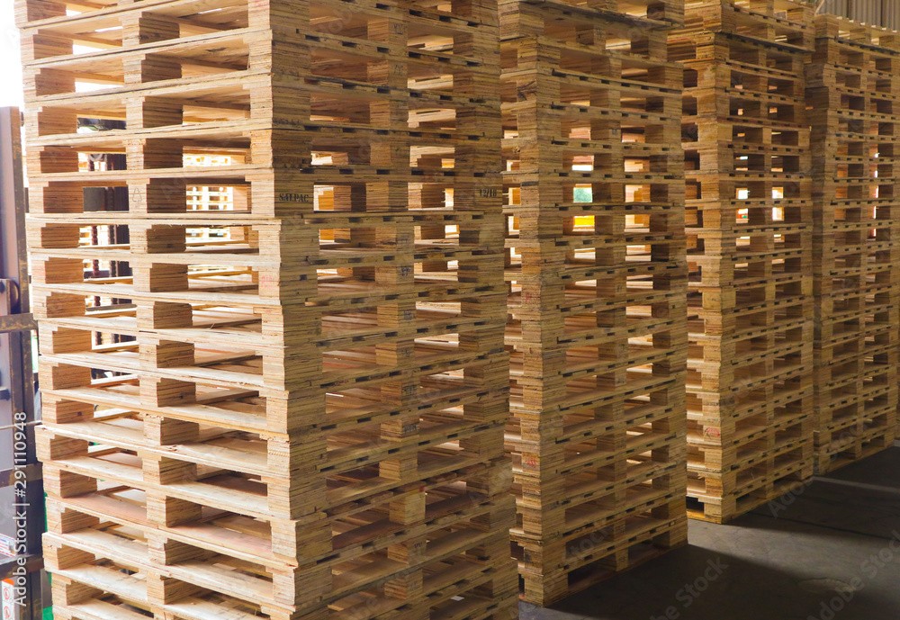 Wooden pallets stack at the freight cargo warehouse for transportation ...
