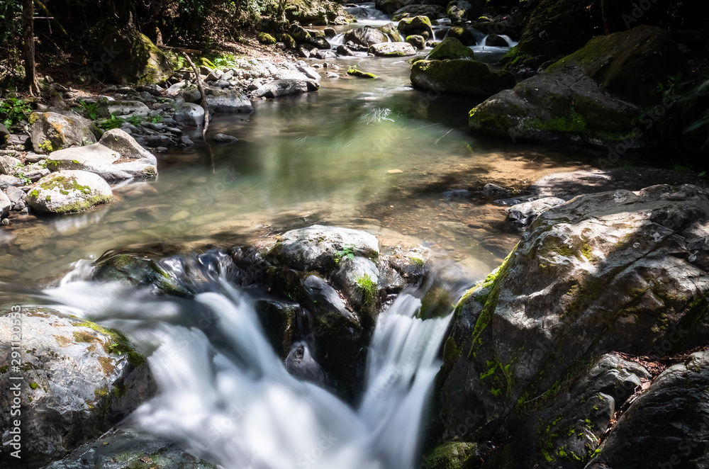Savegre river stream, San Gerardo de Dota, Costa Rica. silky smooth ...