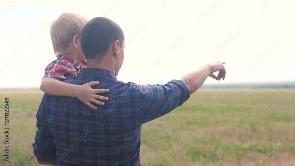 happy family. slow motion video training father and son teamwork ...