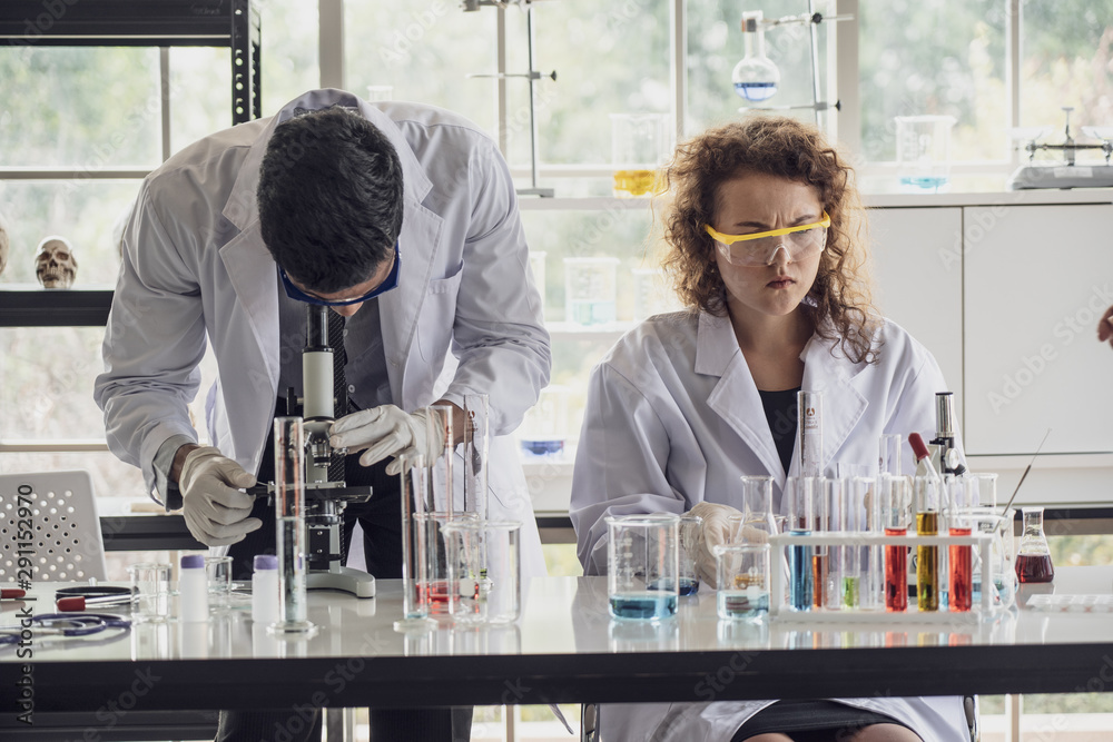 Team of Medical Research Scientist Conducts Experiments in Laboratory ...