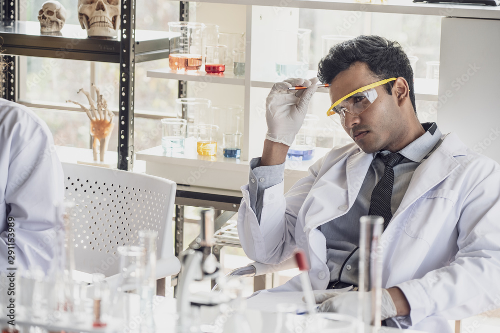 Team of Medical Research Scientist Conducts Experiments in Laboratory ...