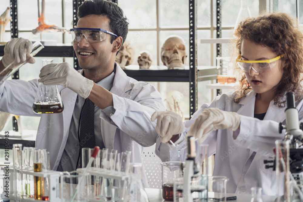 Team of Medical Research Scientist Conducts Experiments in Laboratory ...