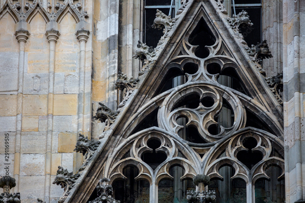 Elements of Gothic architecture. Gable wall rose(rosette) windows on ...