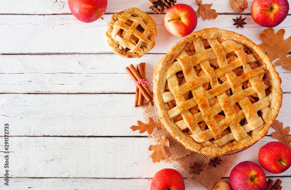 Homemade autumn apple pie corner border. Top view table scene over a ...