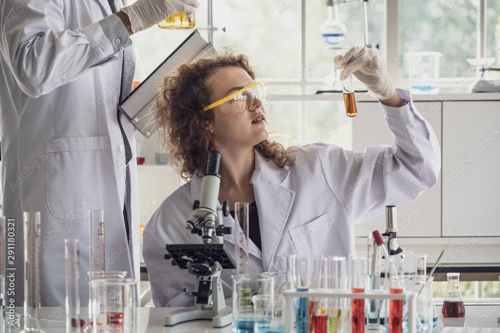 Team of Medical Research Scientist Conducts Experiments in Laboratory ...