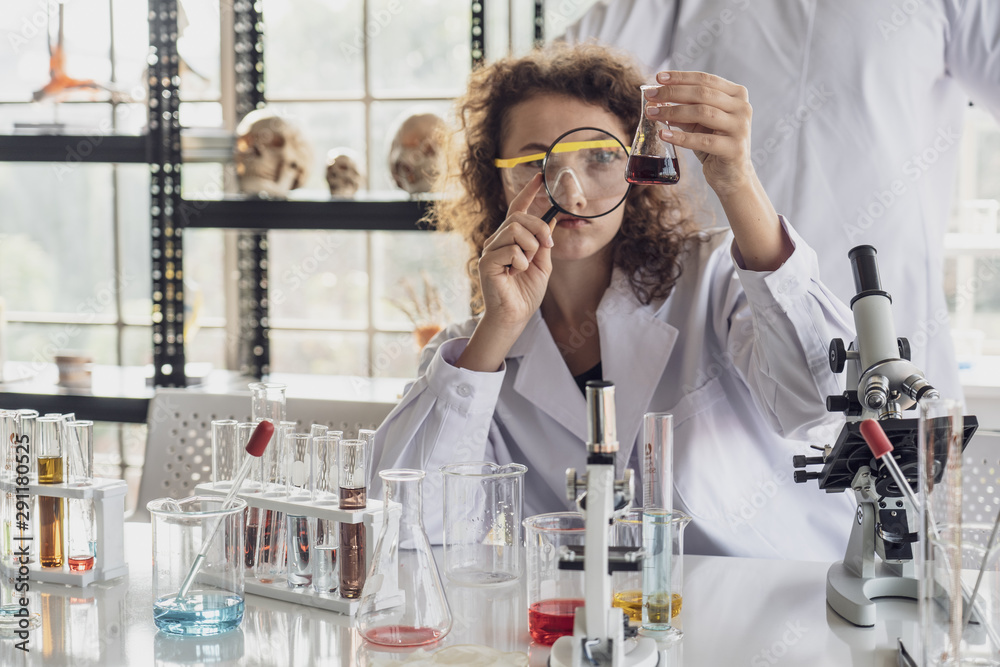 Team of Medical Research Scientist Conducts Experiments in Laboratory ...