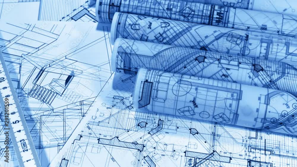 Blueprints - rolls of architectural drawings smoothly rotate on the ...