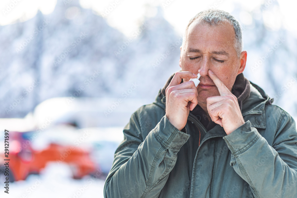 Foto de Illness and sickness. Handsome guy feeling sick dripping nasal ...