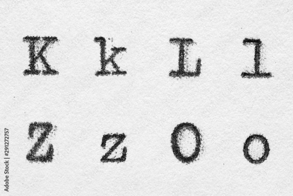 Real typewriter font alphabet with letters K, L, Z, O Stock Photo ...
