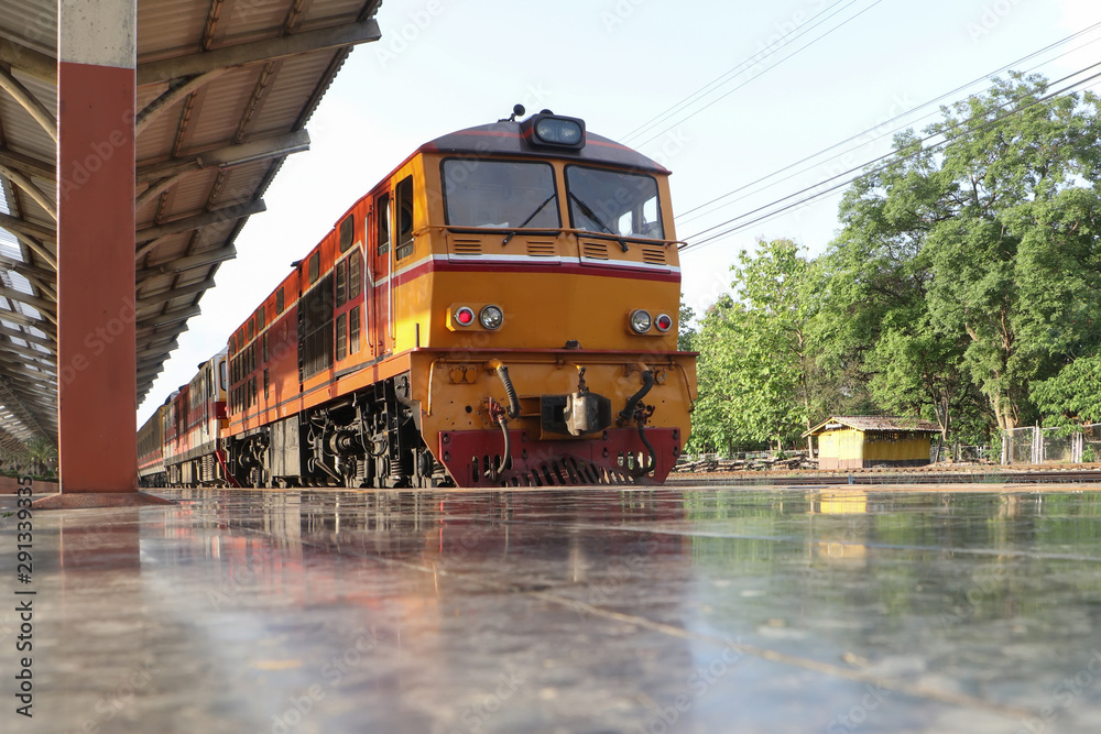 Diesel train at railway station.Diesel locomotive is a type of railway ...