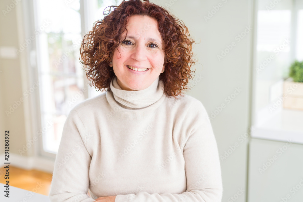 Beautiful senior woman wearing turtleneck sweater with a happy and cool ...