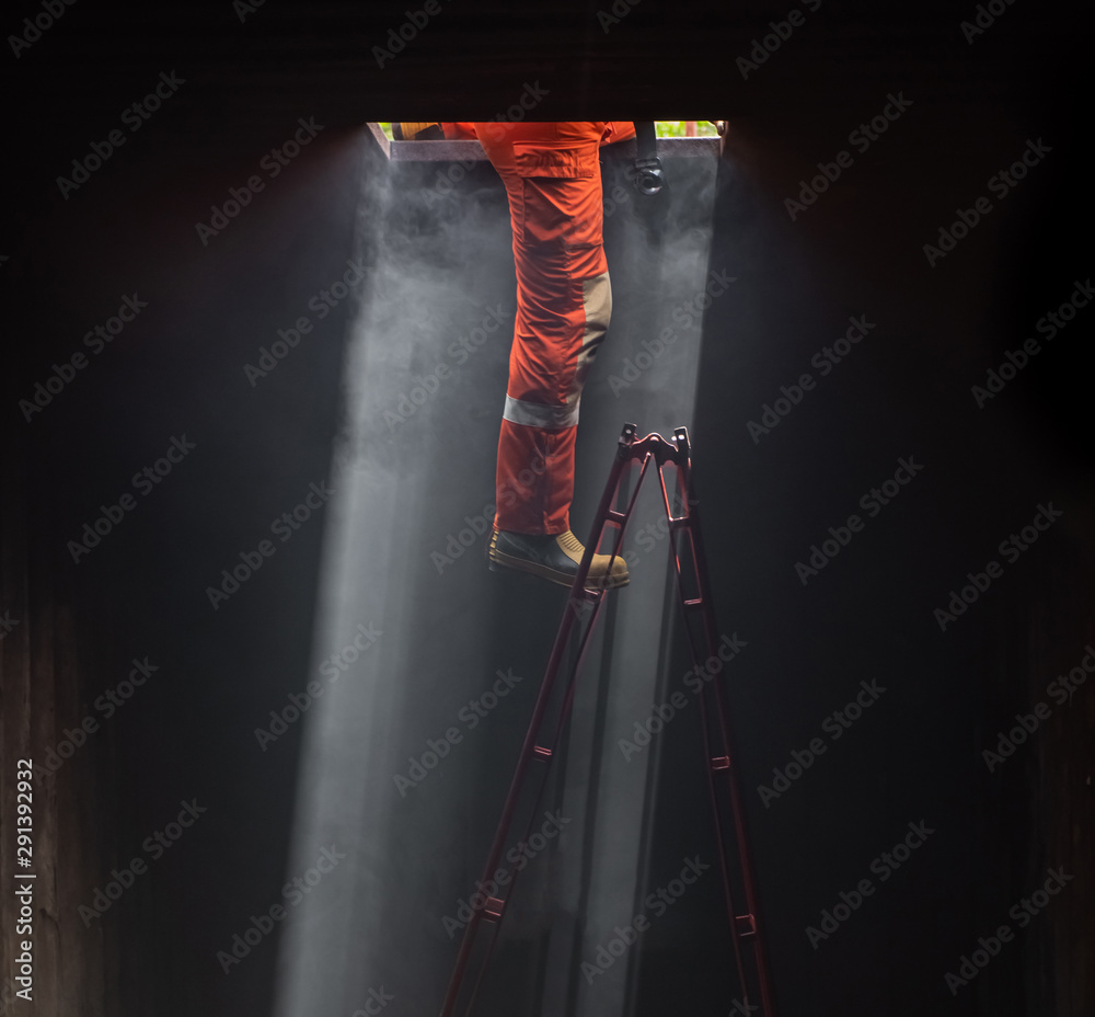 Noise and grain defocus of firefighter in safety fire suit and oxygen ...