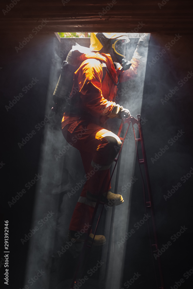 Noise and grain defocus of firefighter in safety fire suit and oxygen ...