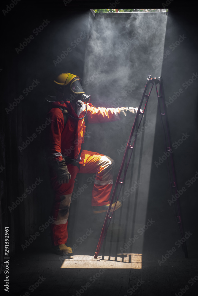 Noise and grain defocus of firefighter man in safety fire suit and ...