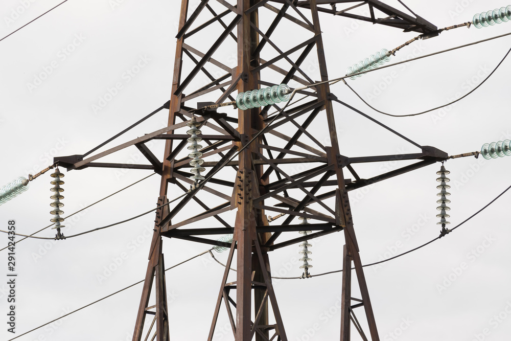 High-voltage technological power lines on metal poles with powerful ...