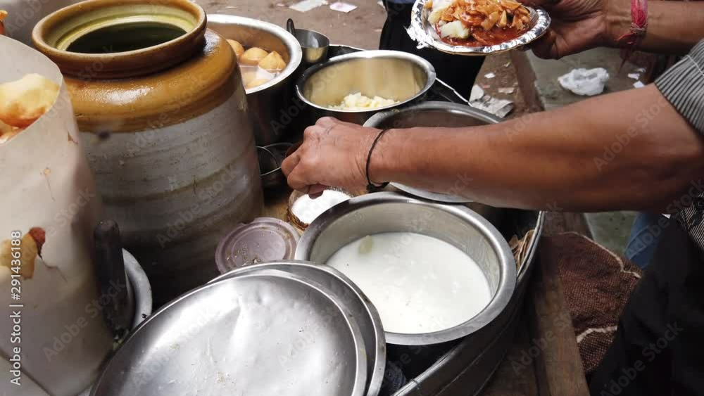 Preparation of Panipuri, a type of snack from UP Bihar region of the ...