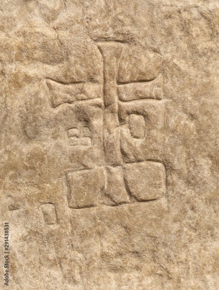 Stone with ancient carvings of viking age type. Old dark ages ...