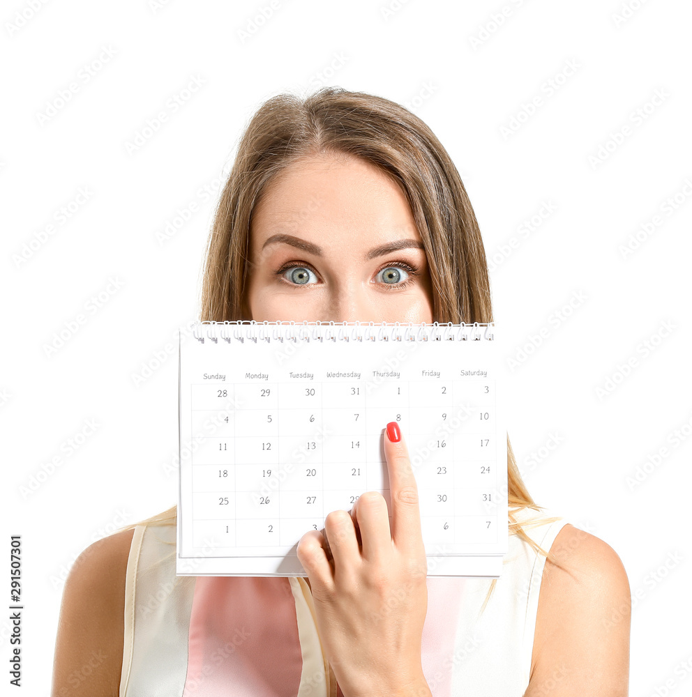 Beautiful young woman with calendar on white background. International ...