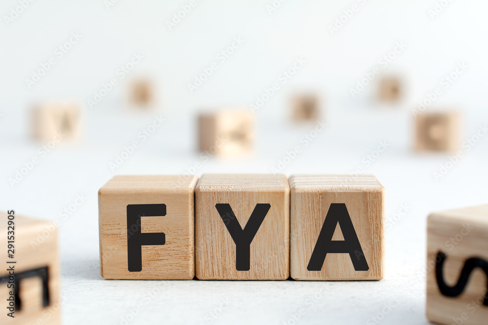 FYA - word from wooden blocks with letters, For Your Attention, for for ...