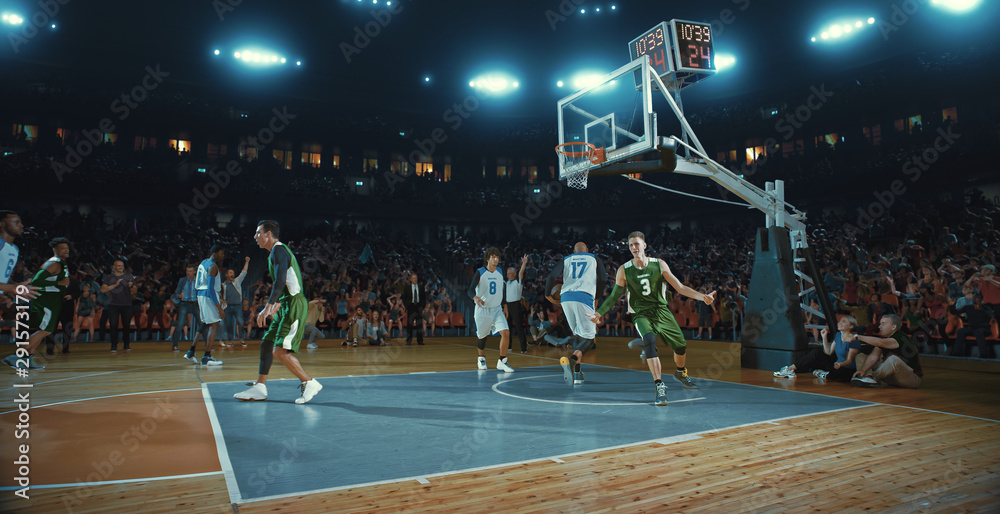 Basketball players on big professional arena during the game. Tense ...