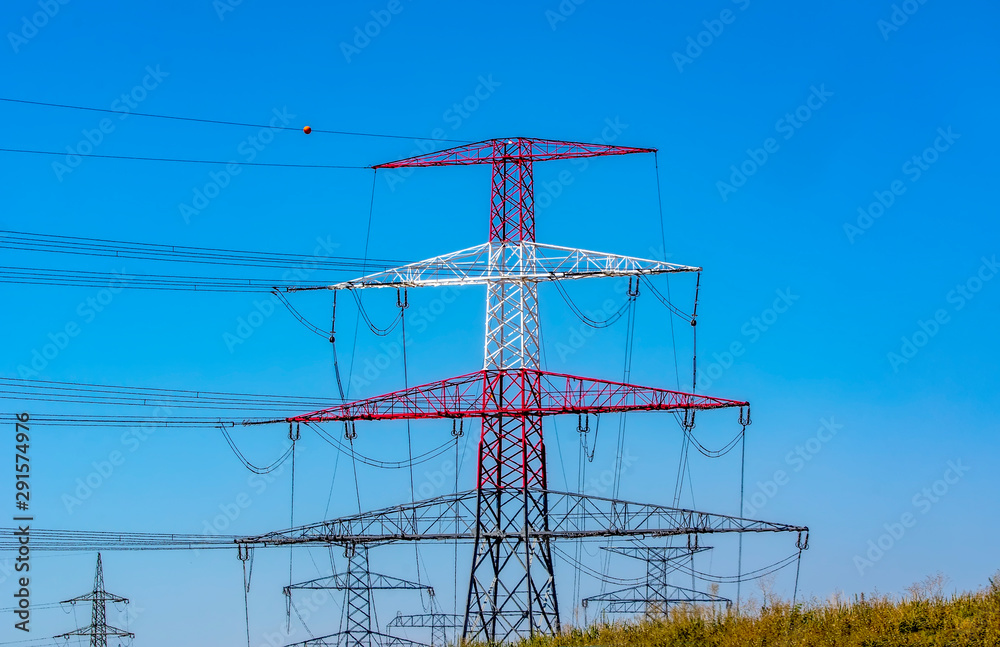 High voltage electricity pylons and transmission power lines on the ...