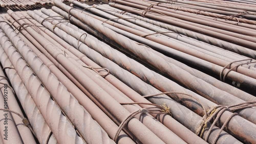 Stack of used drill pipe, heavy weight drill pipe and drill collar for ...