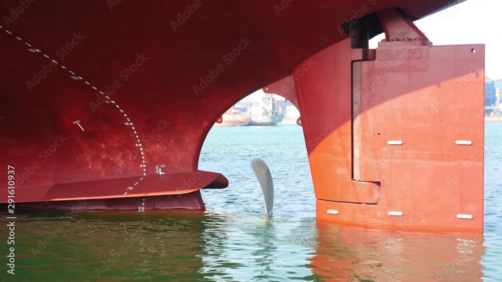 The rudder of a large ship and jack up rigs in the shipyard for repair ...