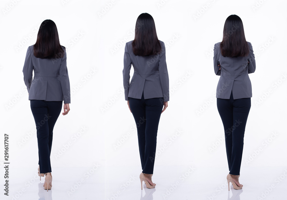 Full Length Snap back view, Asian Business Woman stand in Blue Formal ...