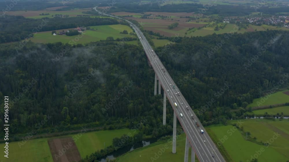 Aerial view of highway Autobahn bridge in Germany on a cloudy and fogy ...