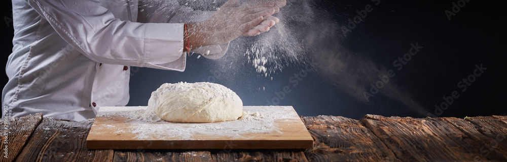 Panorama of a chef clapping hands with flour Stock Photo | Adobe Stock