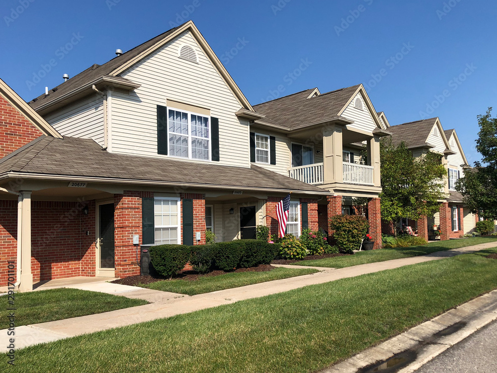 Condominium homes in an upscale Detroit suburb. Stock Photo | Adobe Stock