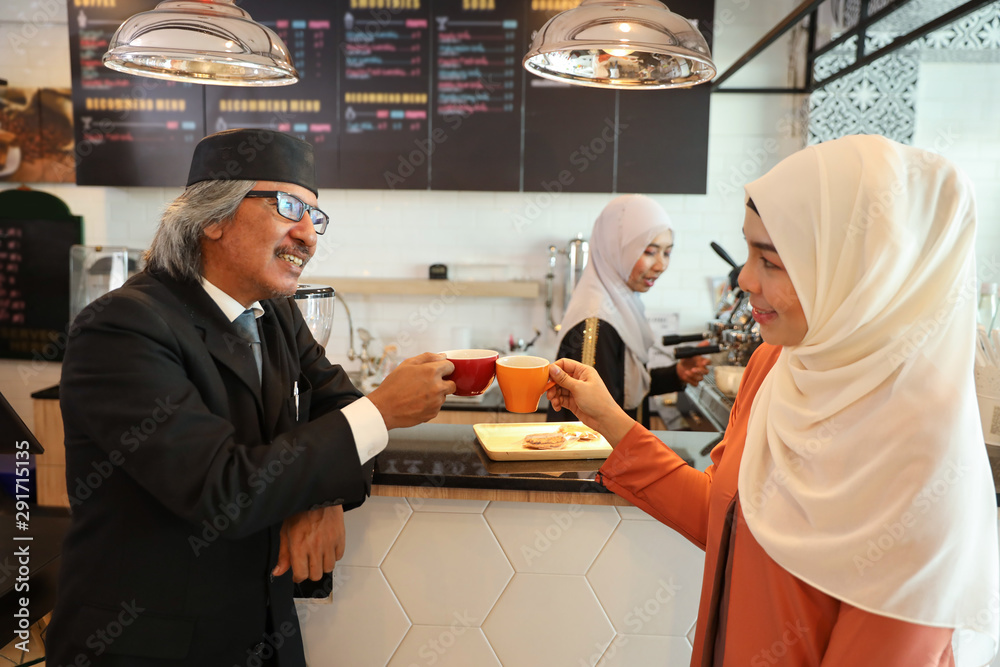 muslim customer businessman wearing black suit drinking coffee at ...