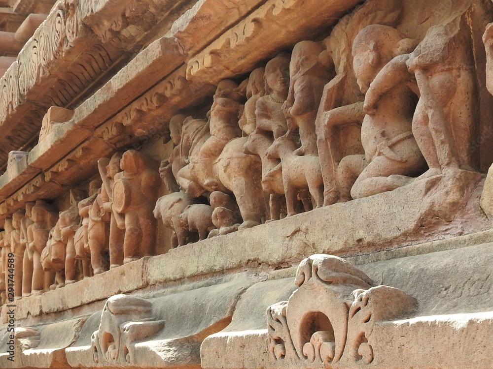 Ancient bas-relief at famous erotic temple in Khajuraho, India. Most ...