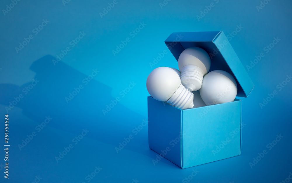 Ideas inspiration concepts with group of lightbulb in blue box on color ...