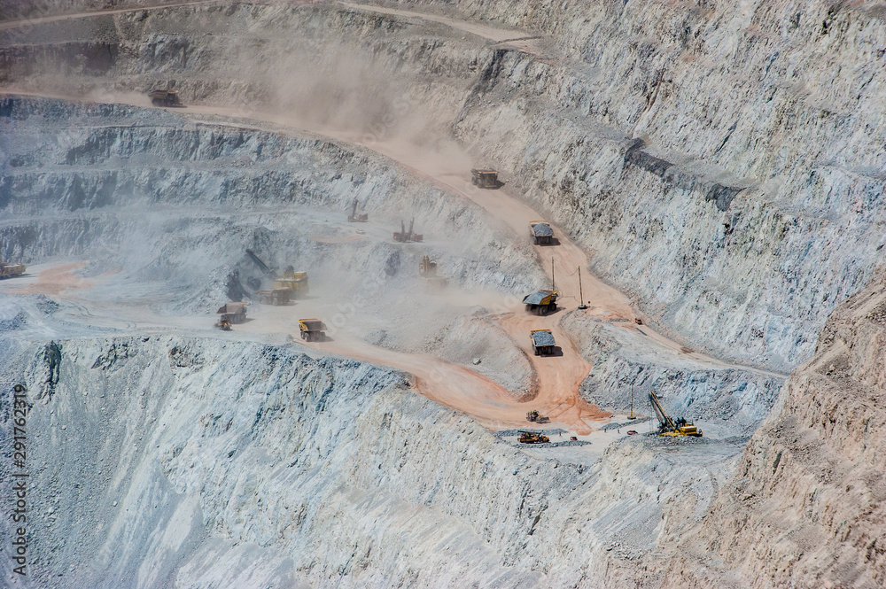 Big trucks and machinery at Chuquicamata, world's biggest open pit ...
