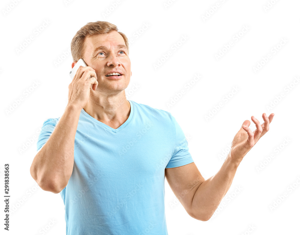 Portrait of handsome man talking by phone on white background Stock ...