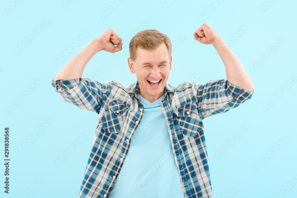 Portrait of handsome happy man on color background Stock Photo | Adobe ...